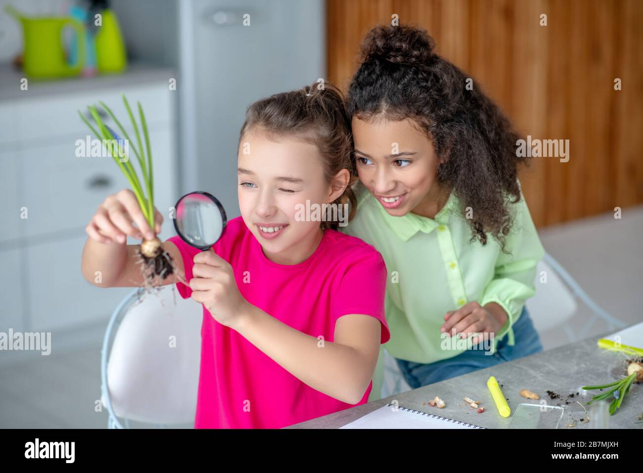 Girl sitting in roots hi-res stock photography and images - Alamy
