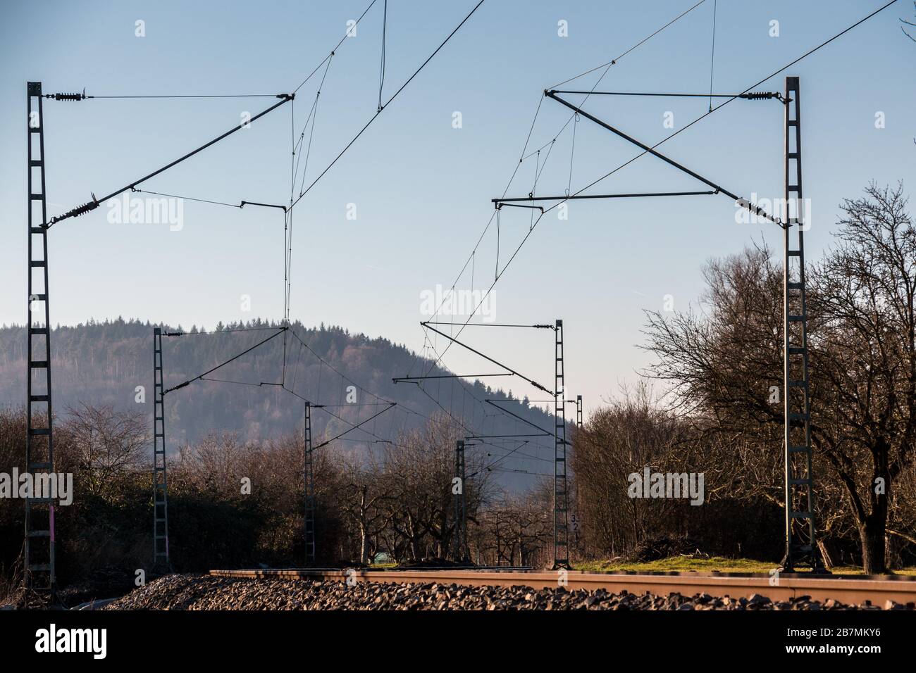 Power lines and rails along the countryside ready for transport Stock ...