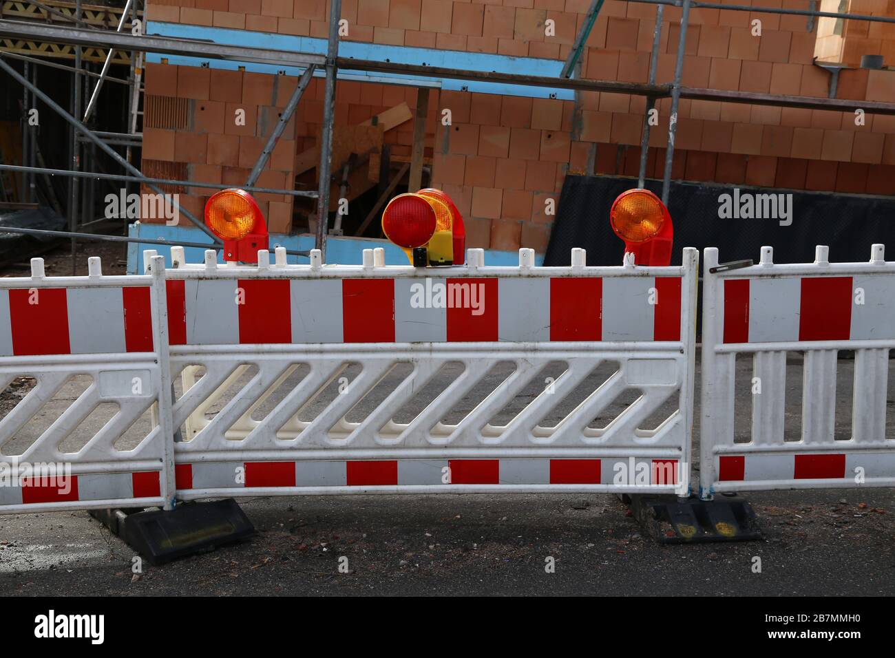 Roadblock. Special fences block off traffic during house construction ...