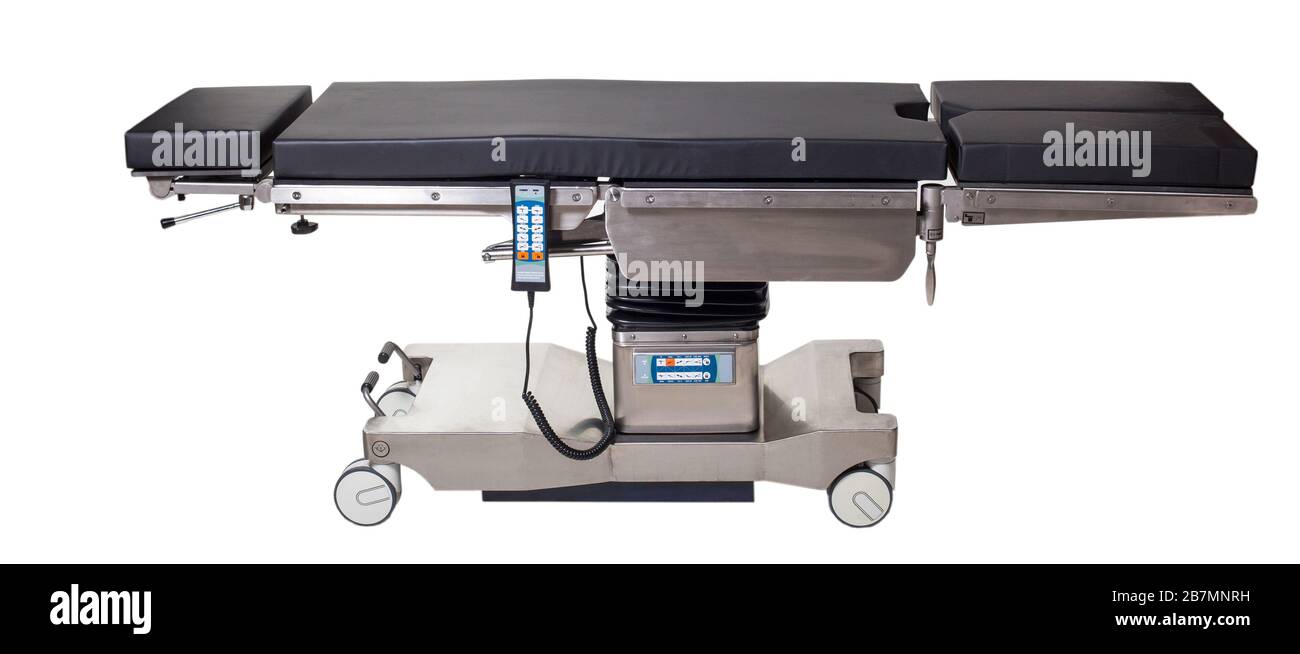 Modern hospital medical equipment operation bed and diagnostic table on ...
