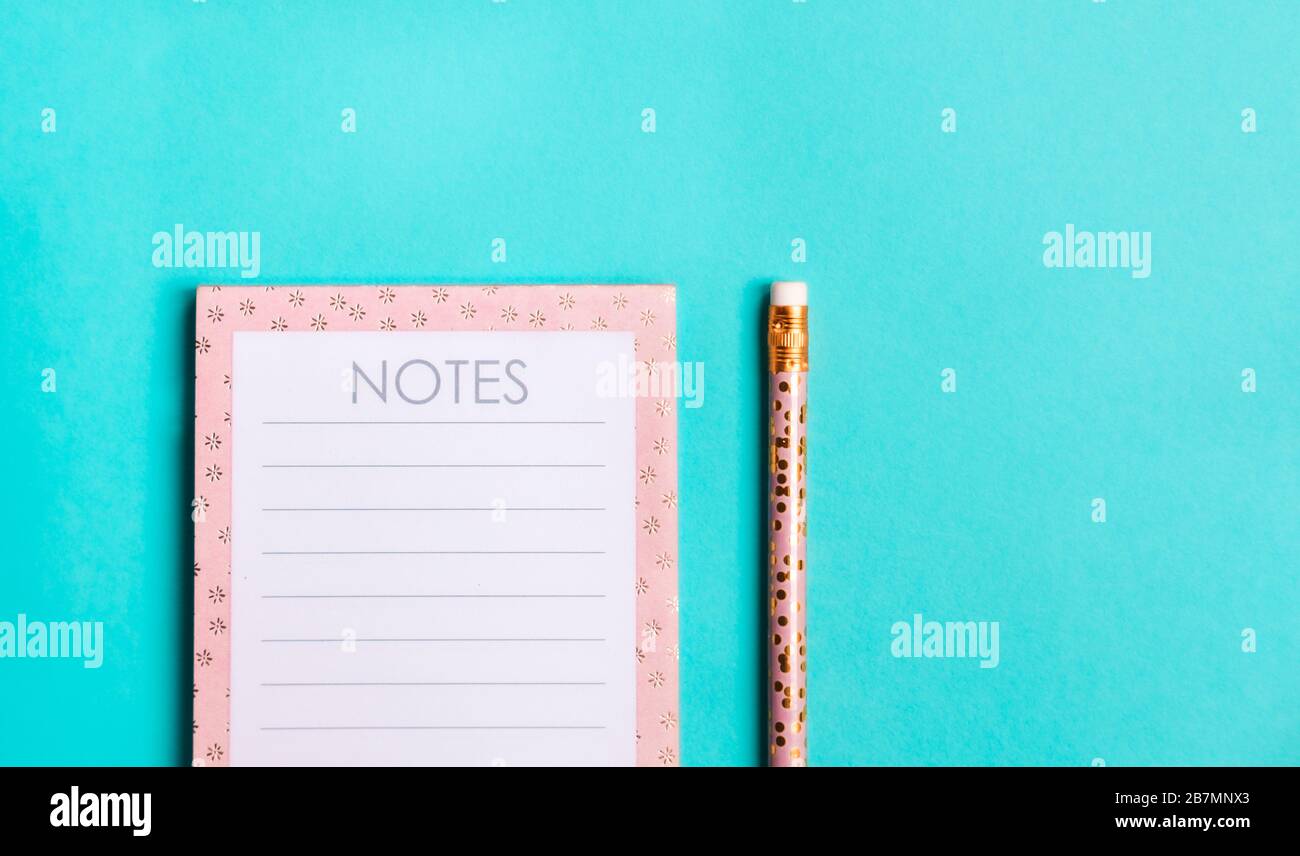 Notebook and pencil Stock Photo - Alamy