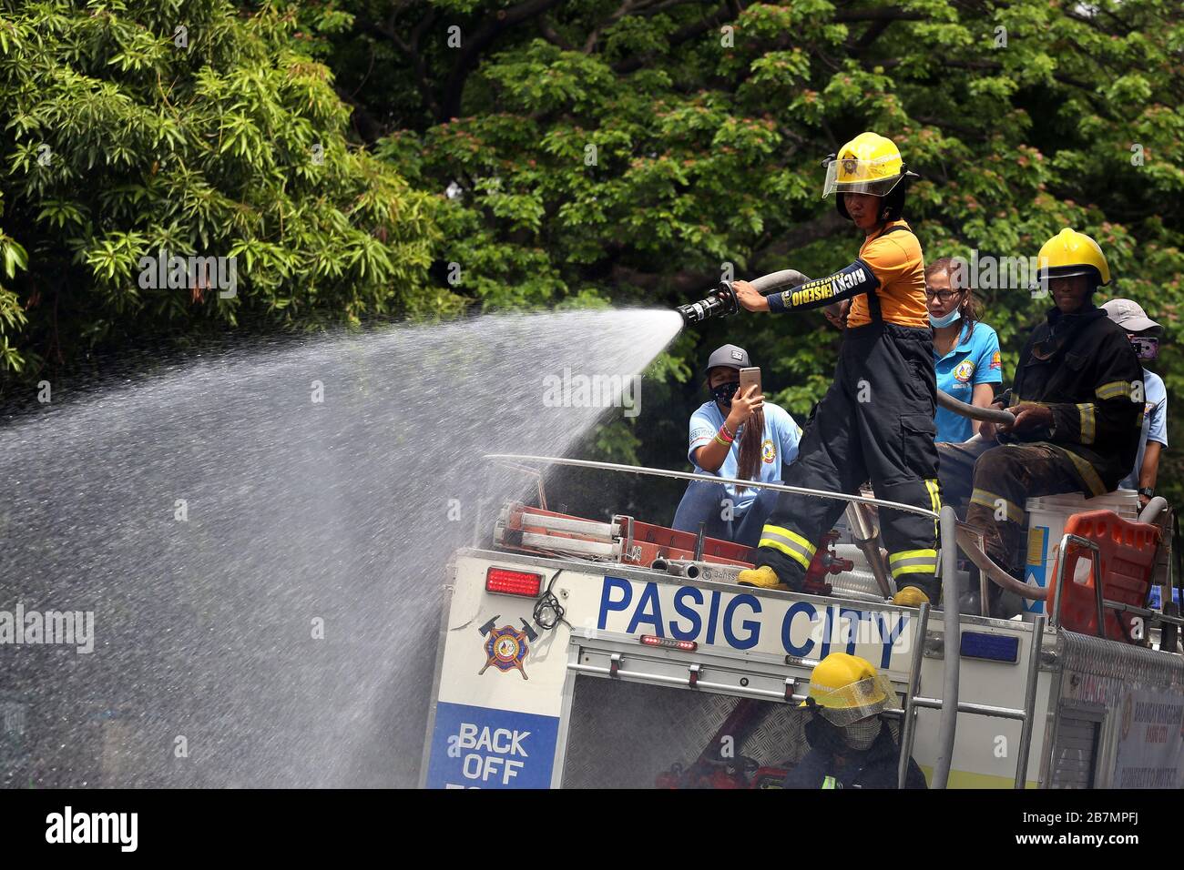Manila, Philippines. 17th Mar, 2020. The fire department is cleaning ...