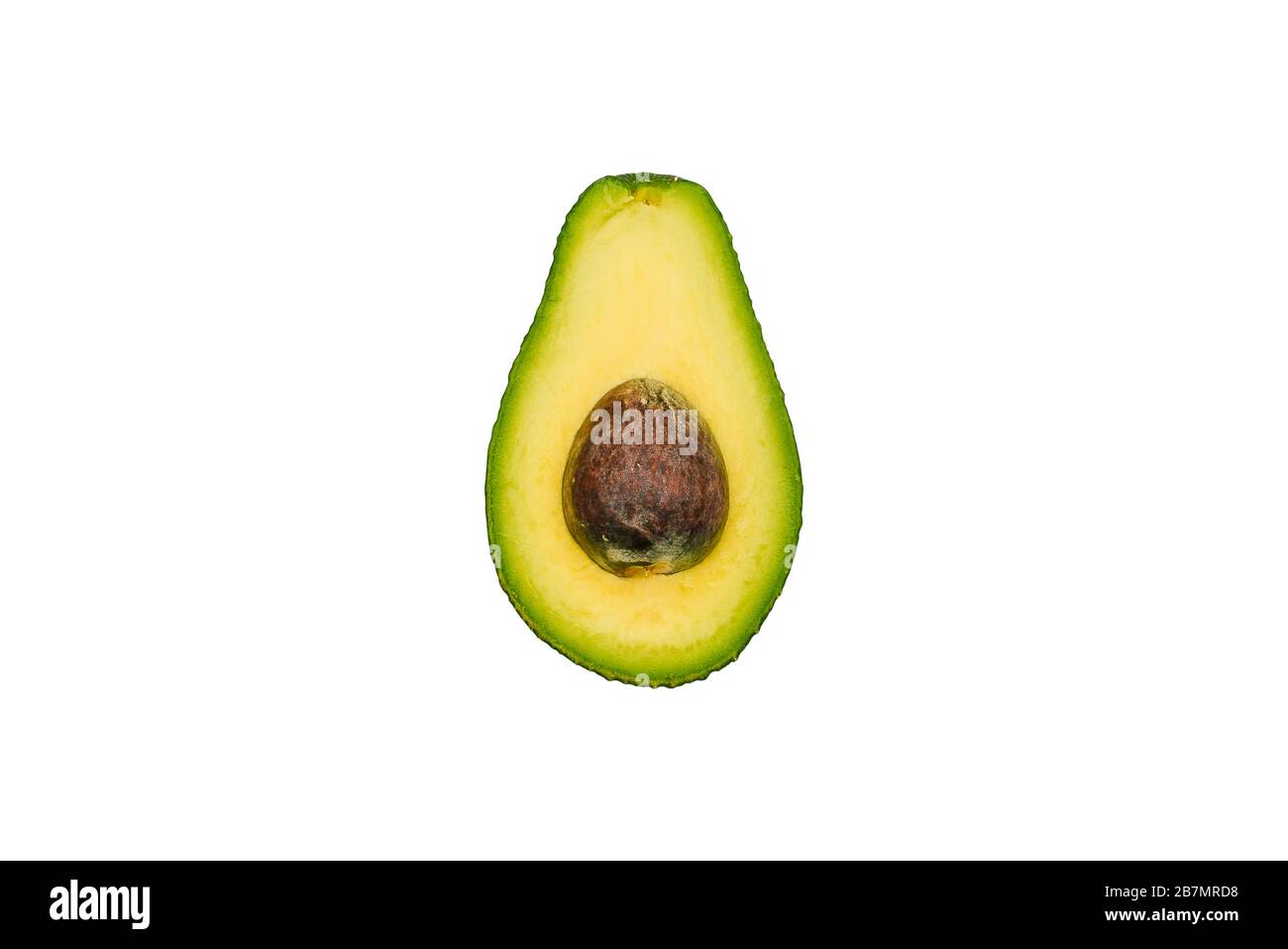 One half avocado isolated on a white background. One slice of avocado ...