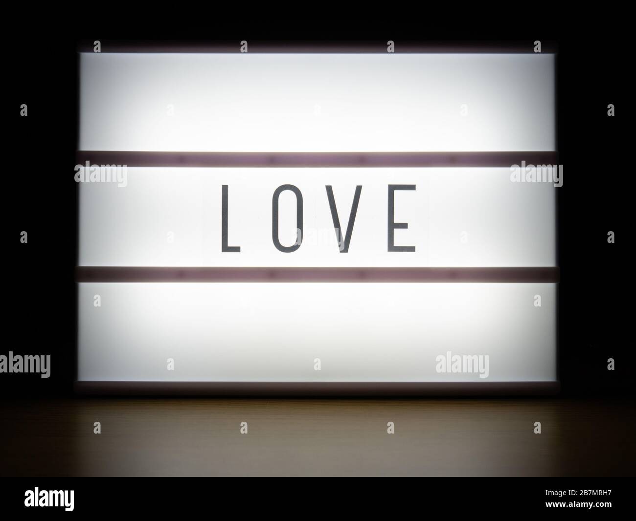LED light box love message sign in dark Stock Photo - Alamy