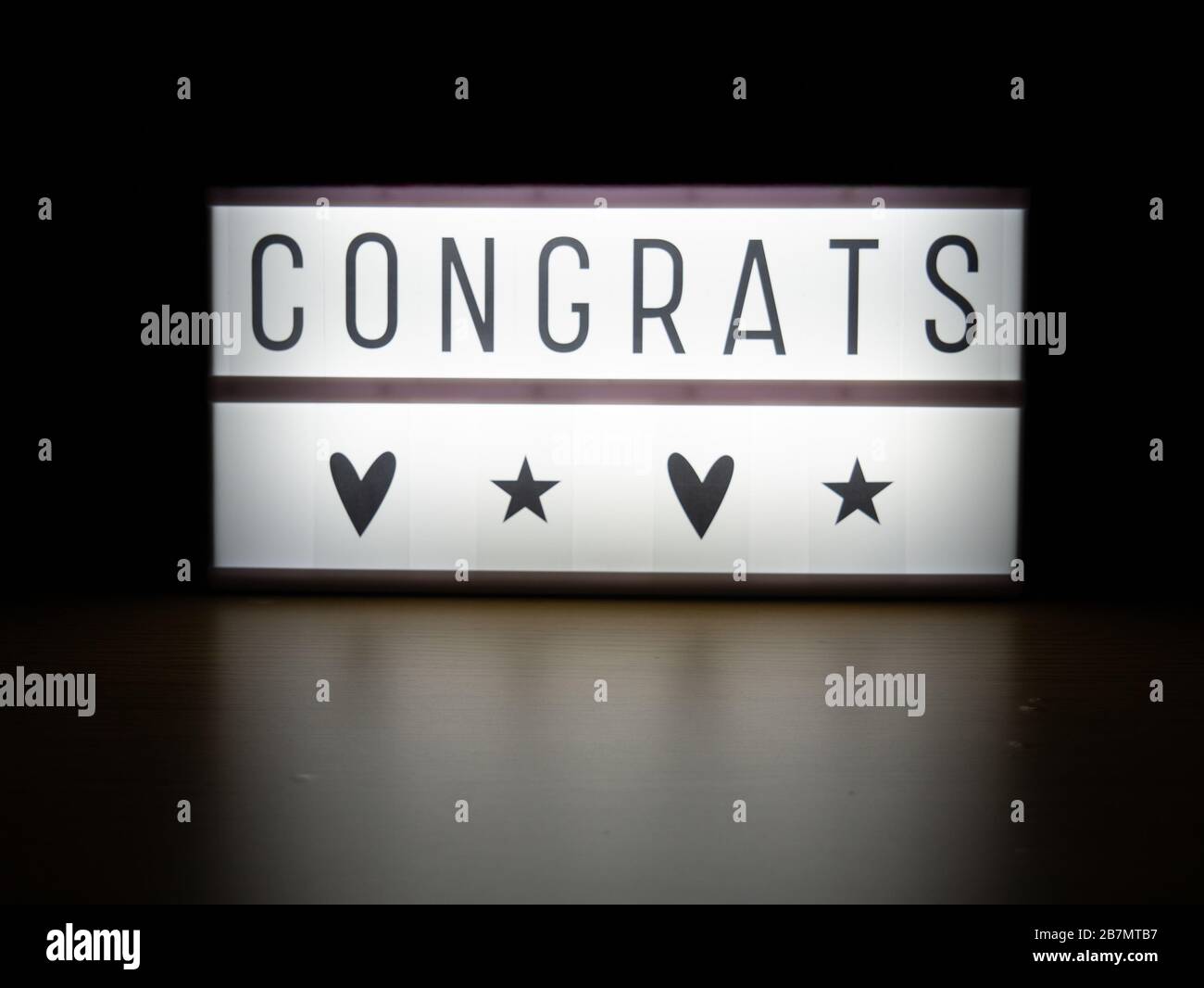 LED light box congrats message board in dark Stock Photo - Alamy