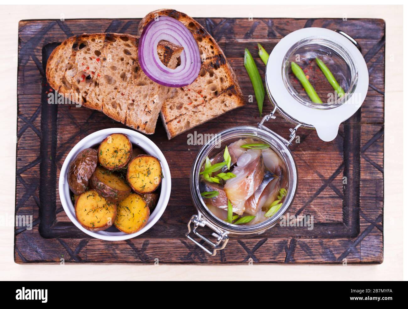 Restaurant dish - Marinated mackerel in a glass jar - snack under vodka ...
