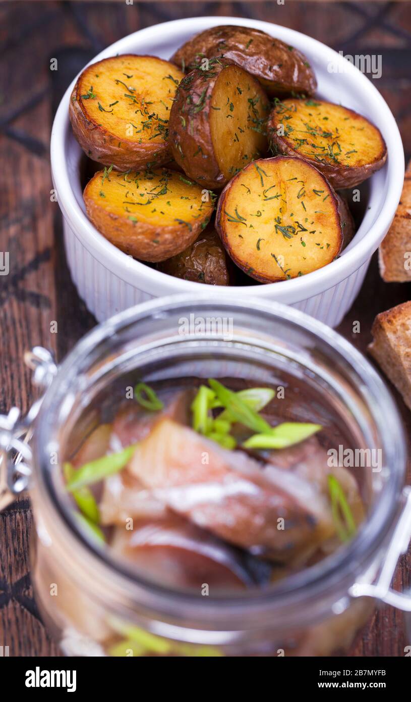 Restaurant dish - Marinated mackerel in a glass jar - snack under vodka ...
