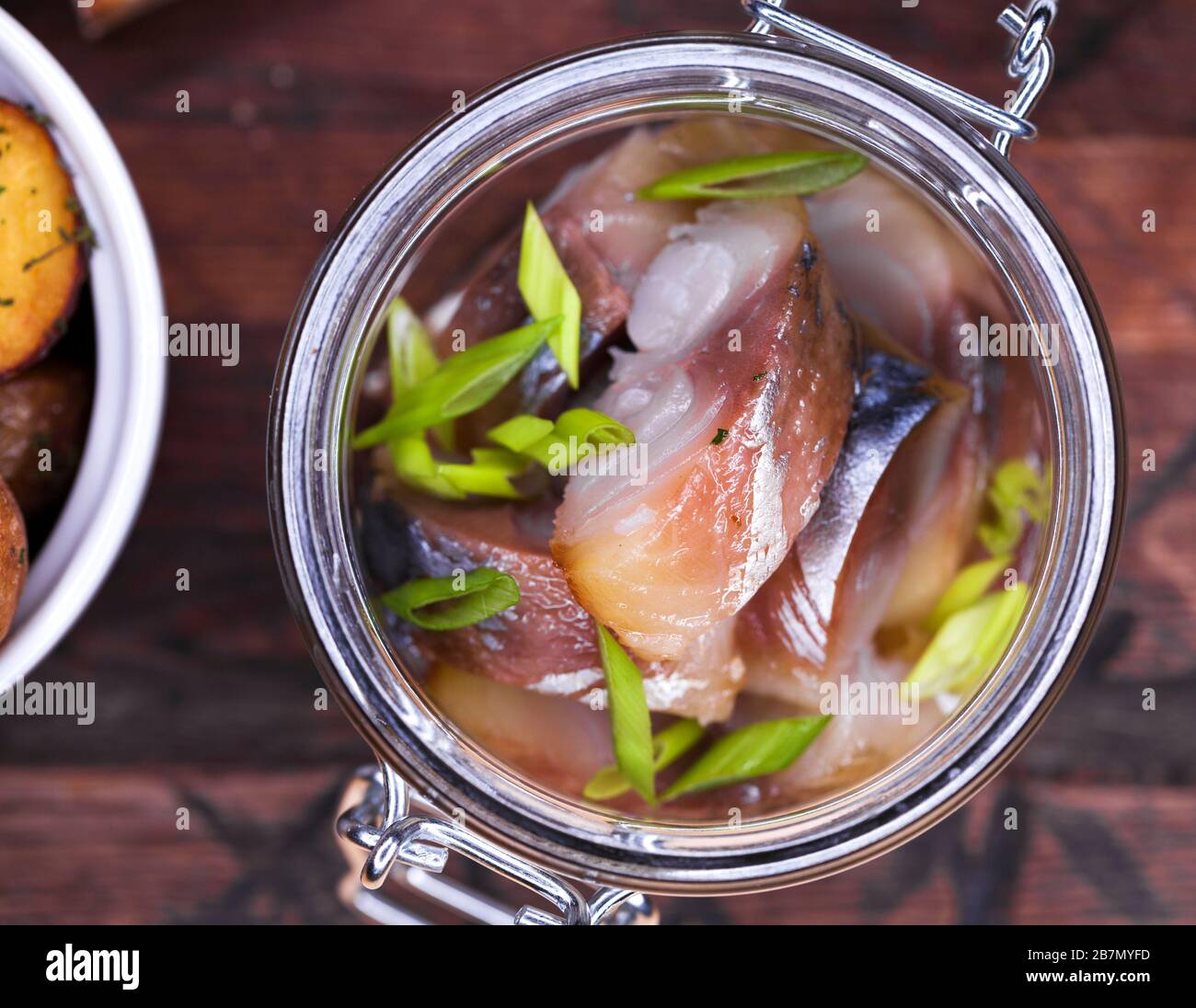 Restaurant dish - Marinated mackerel in a glass jar - snack under vodka ...