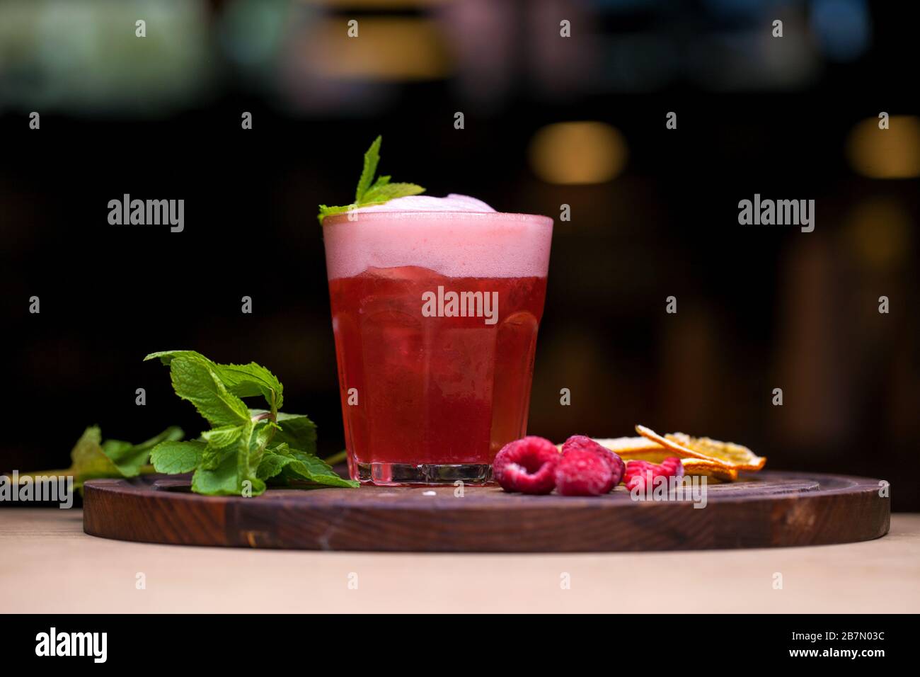 Alcoholic cocktail with raspberry flavor Stock Photo - Alamy
