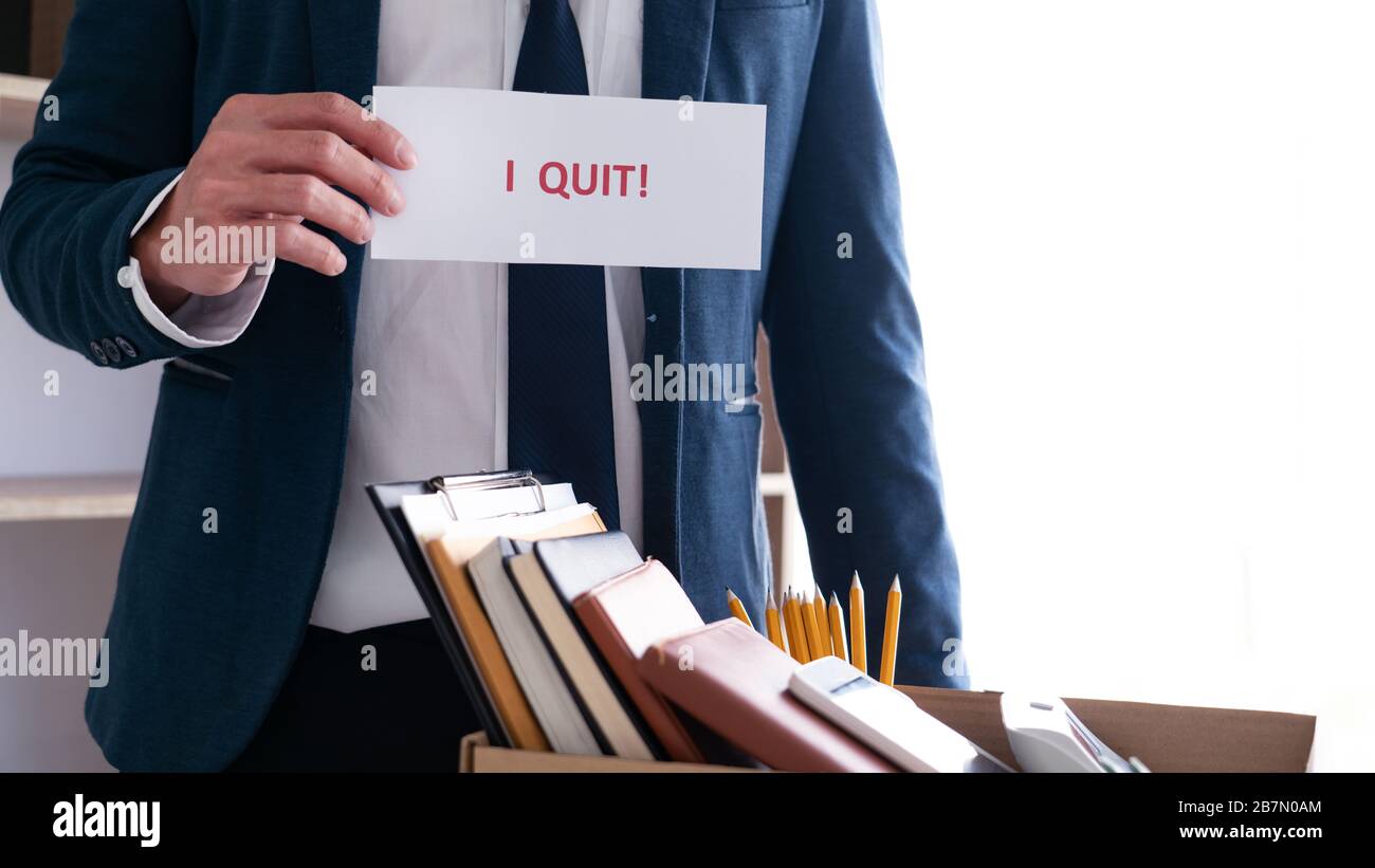 Businessman holding with I quit words card letter, resign employee ...
