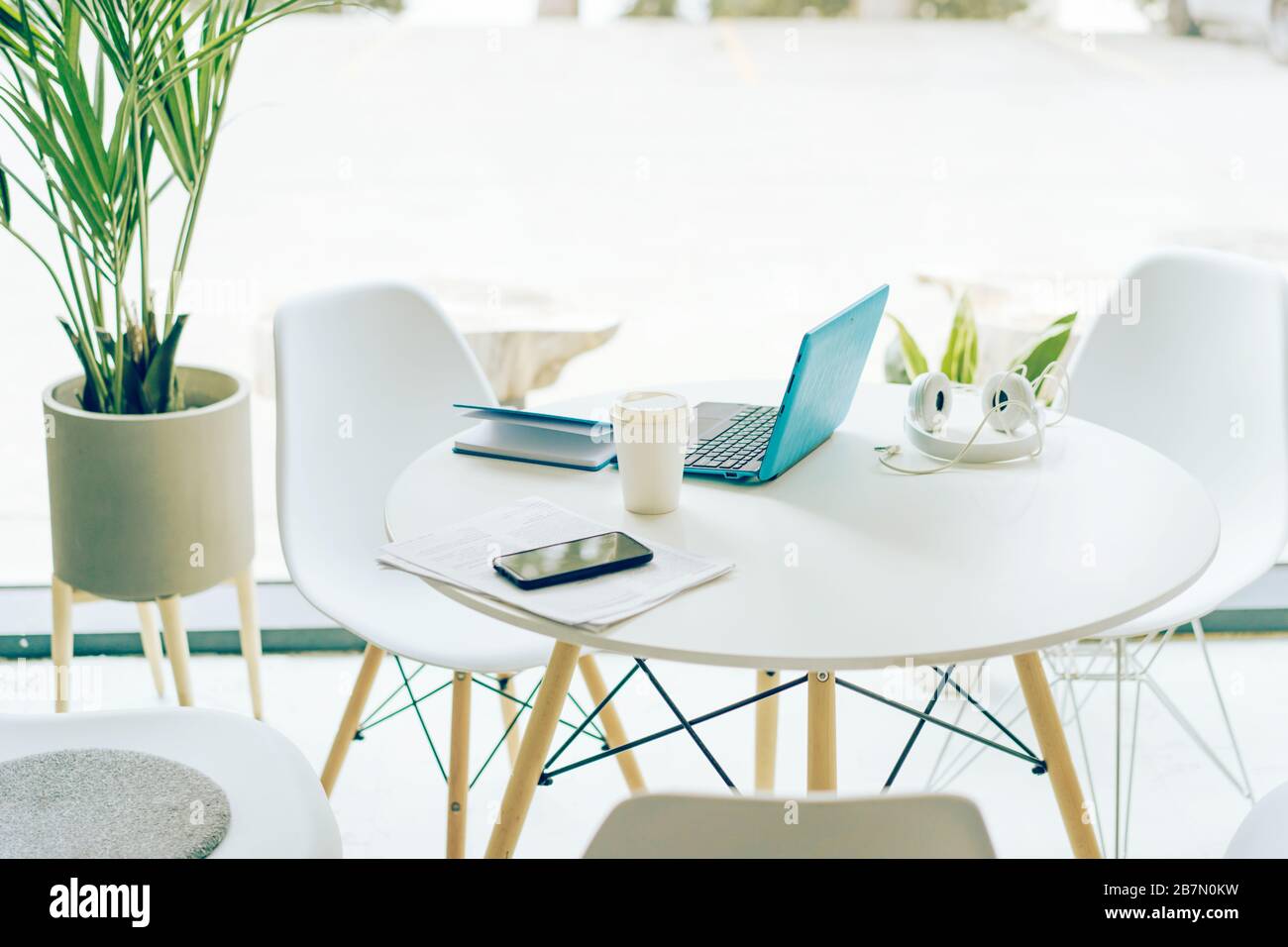 workplace in a bright cafe Stock Photo - Alamy