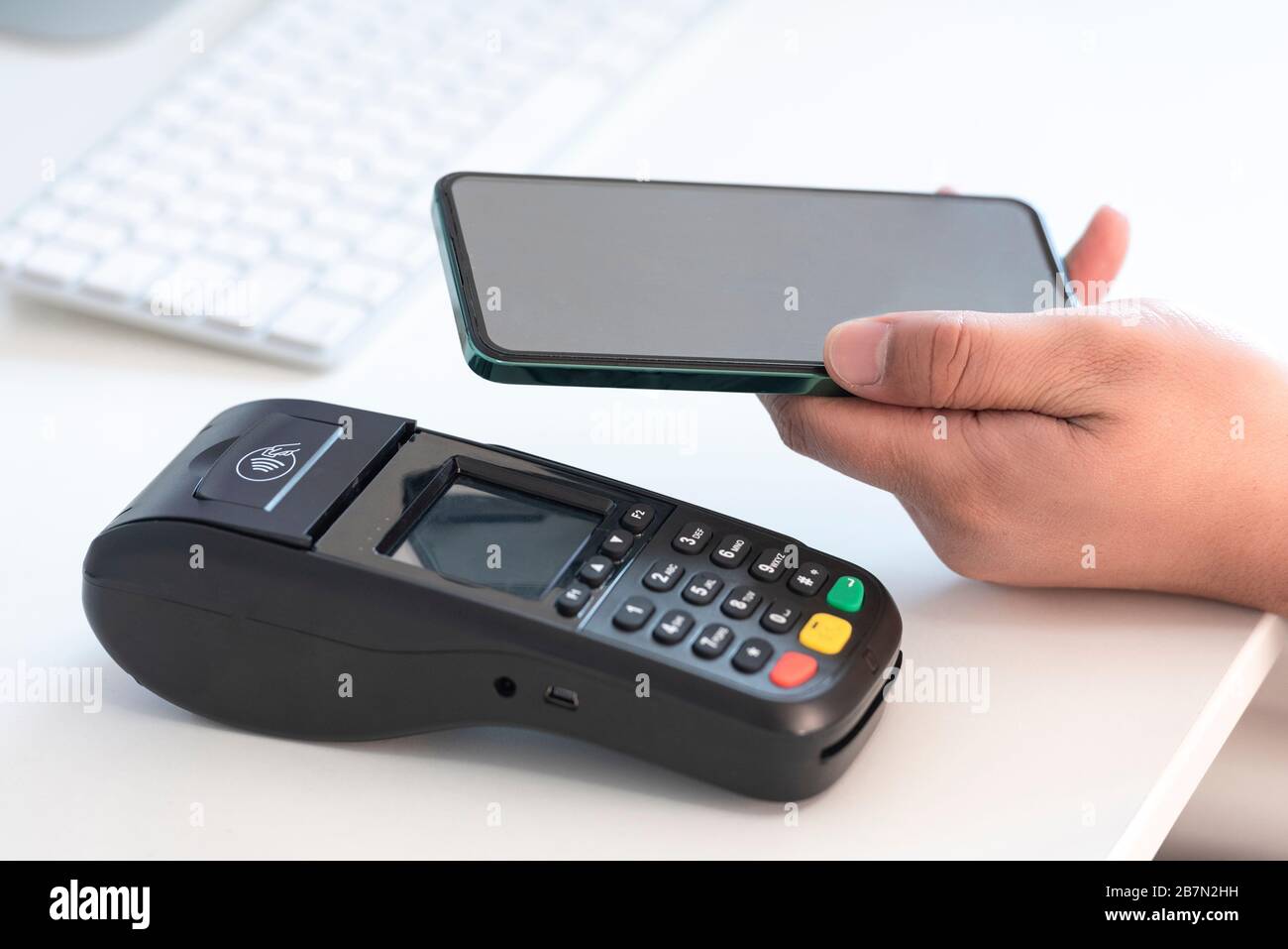 Cell phones and POS machines in the Office Stock Photo - Alamy