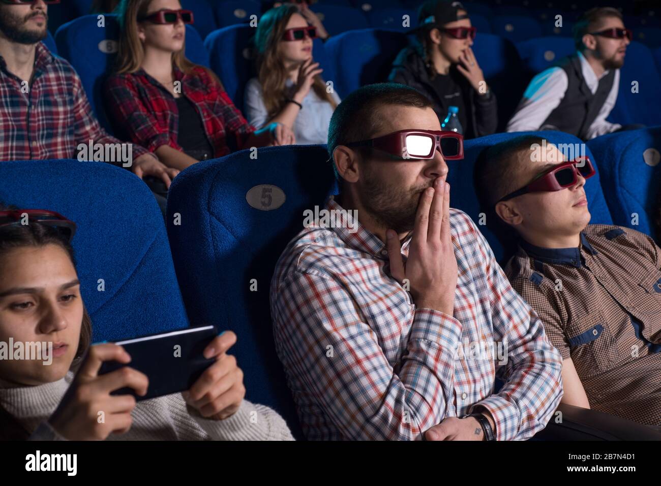 Boring movie theater hi-res stock photography and images - Alamy