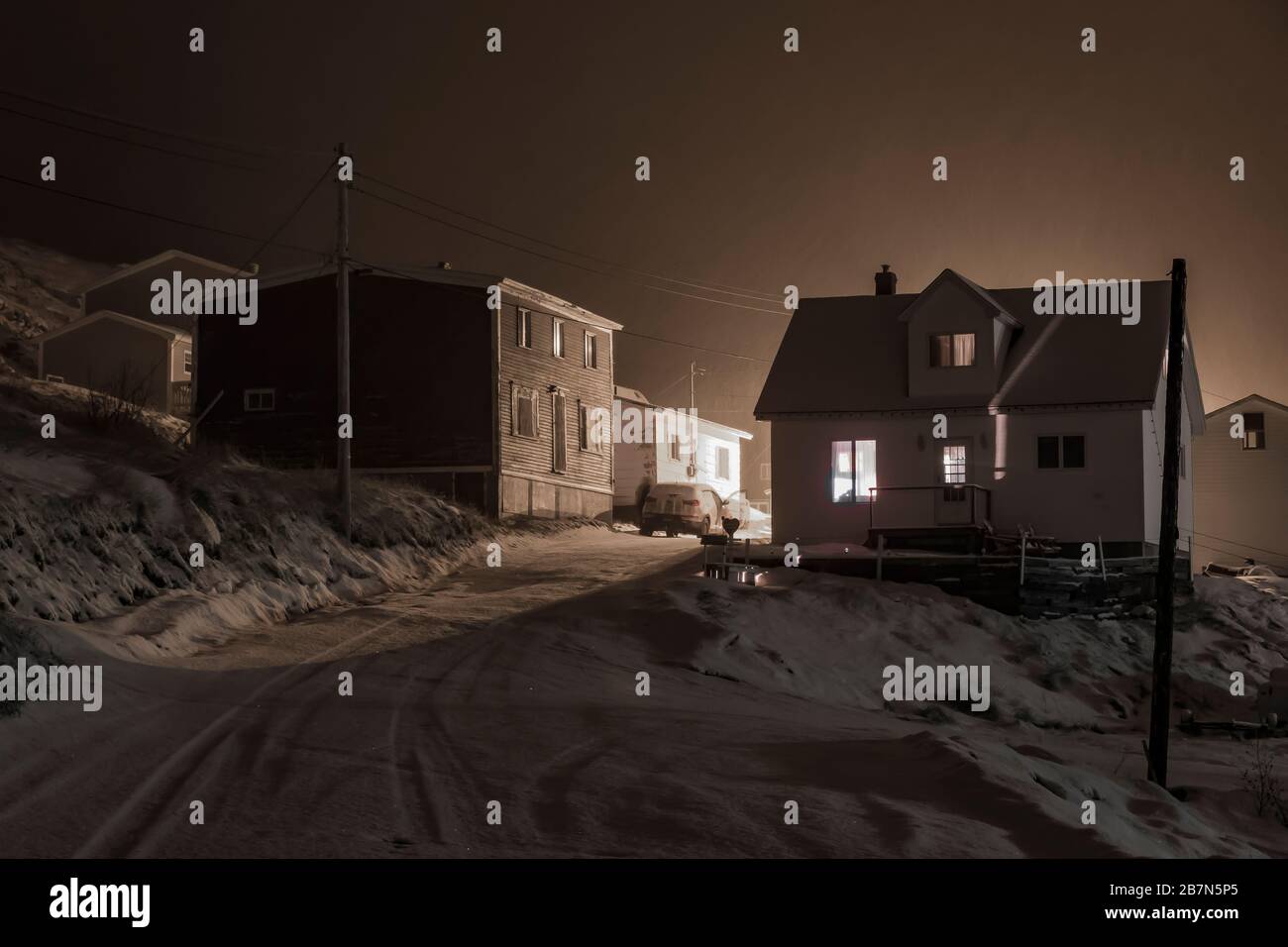 Houses at night in the old fishing village of Dunfield in Newfoundland ...