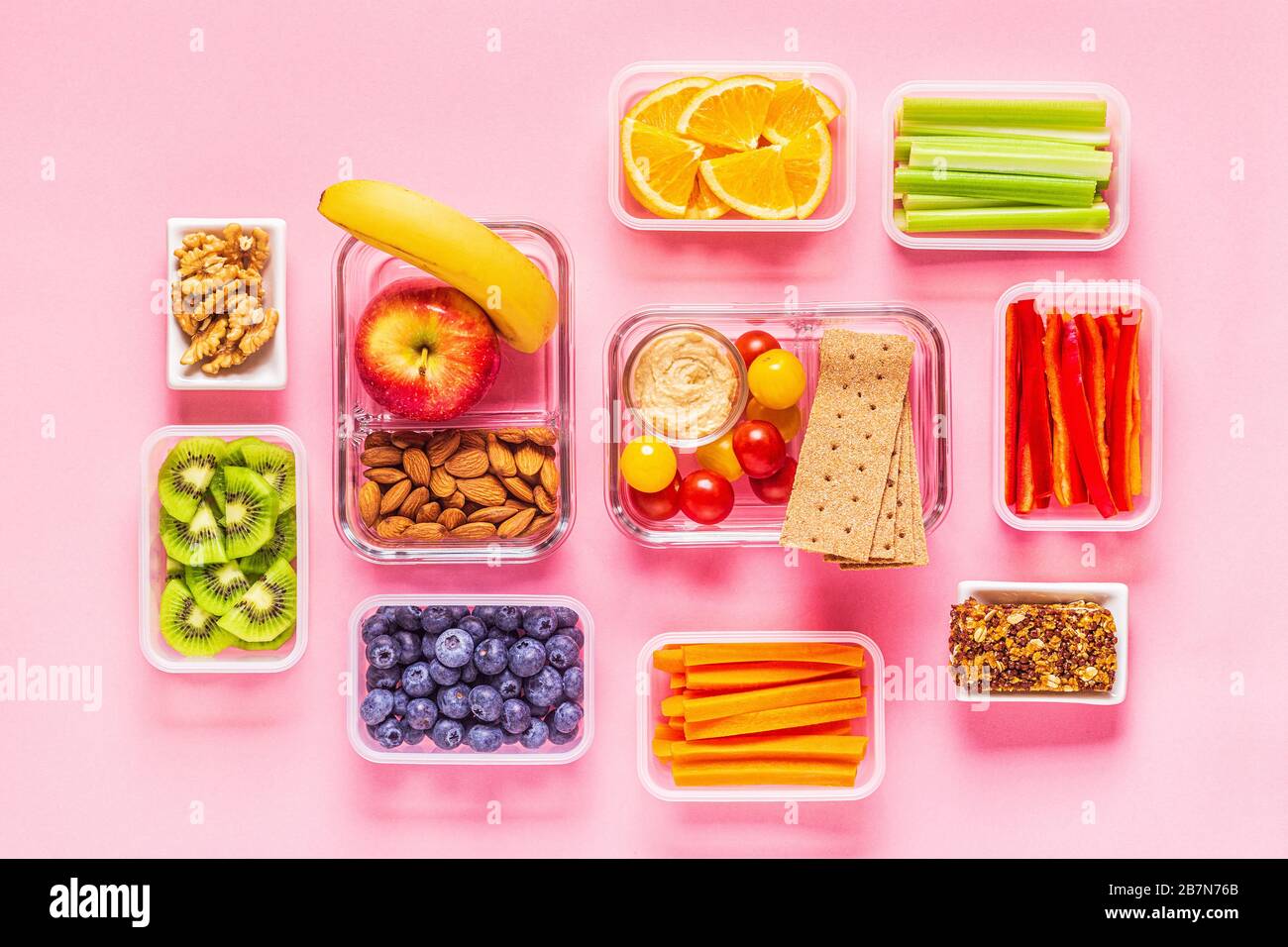 Healthy snack on a pastel background, top view Stock Photo - Alamy