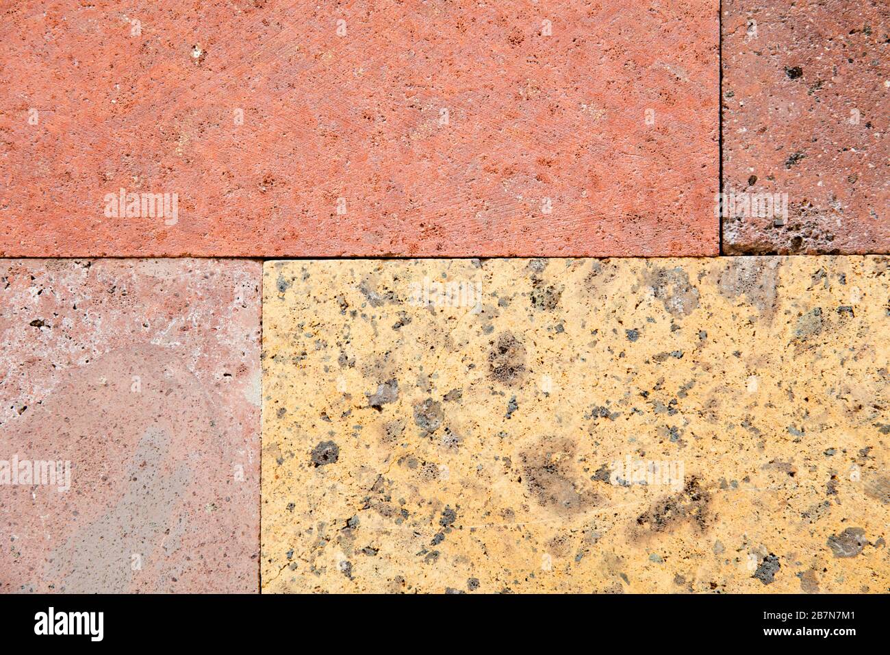 Detail of colorful concrete wall blocks as a backdrop Stock Photo - Alamy