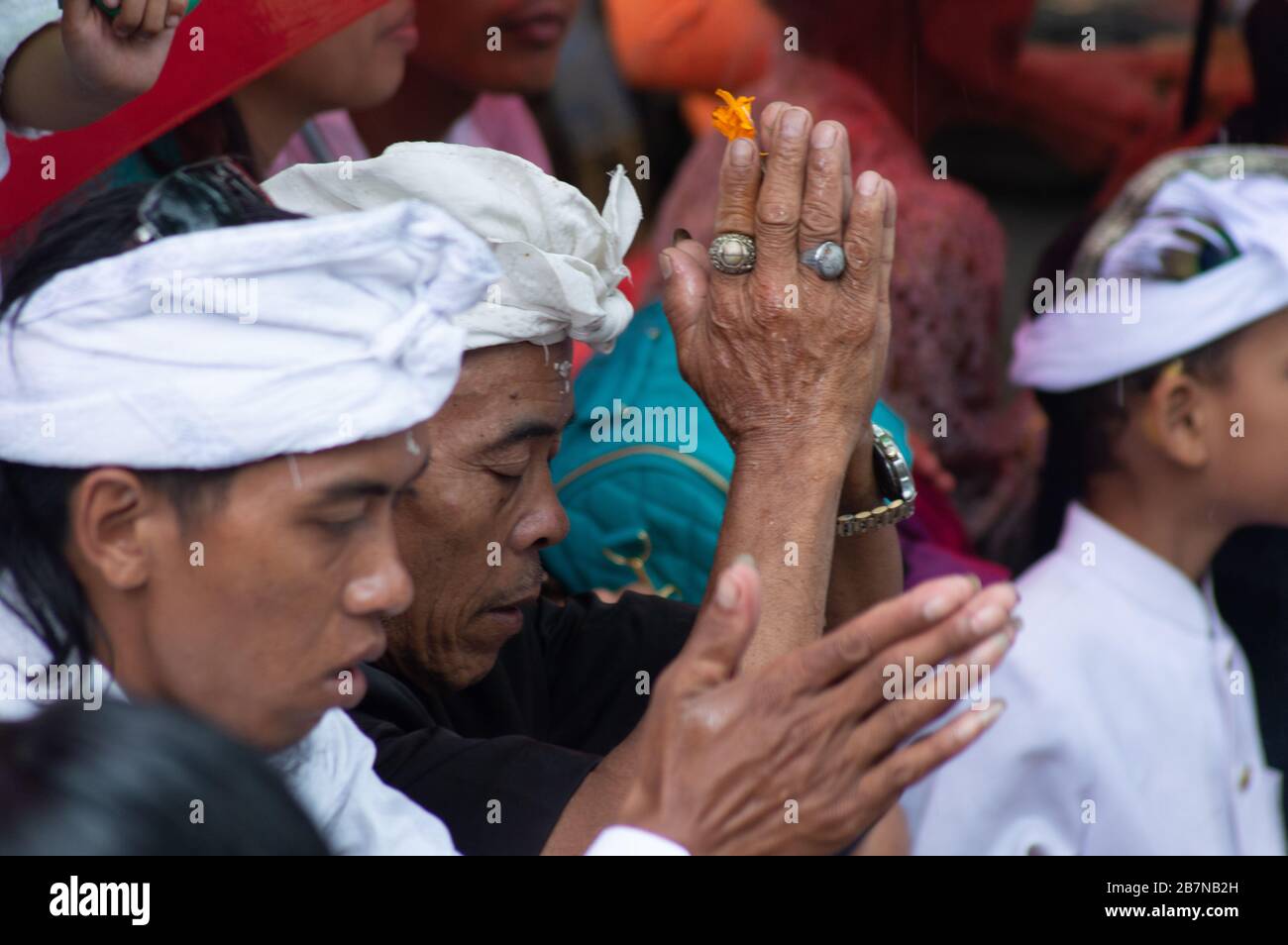 Pepole praying during the holy Celebration at Besakih temple. Bali ...