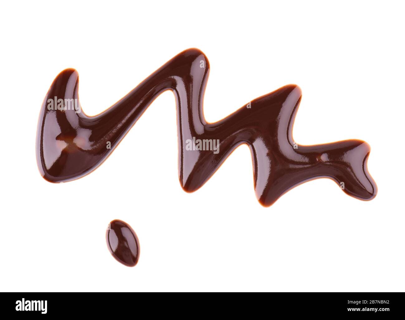 Chocolate syrup drizzle isolated on white background. Splashes of sweet ...