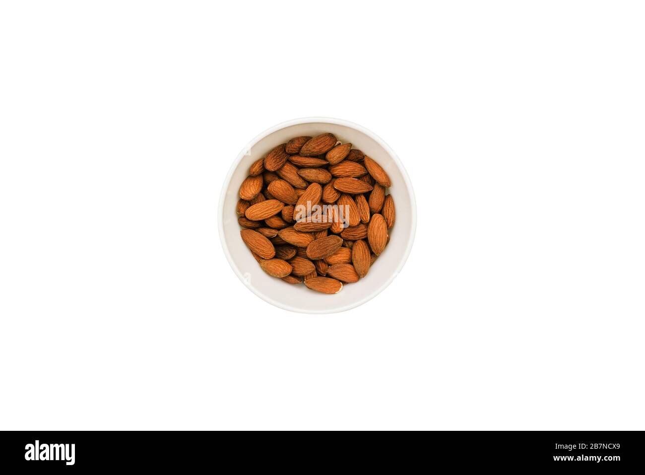 Almonds isolated on a white background. Kernels of dried almonds in a ...
