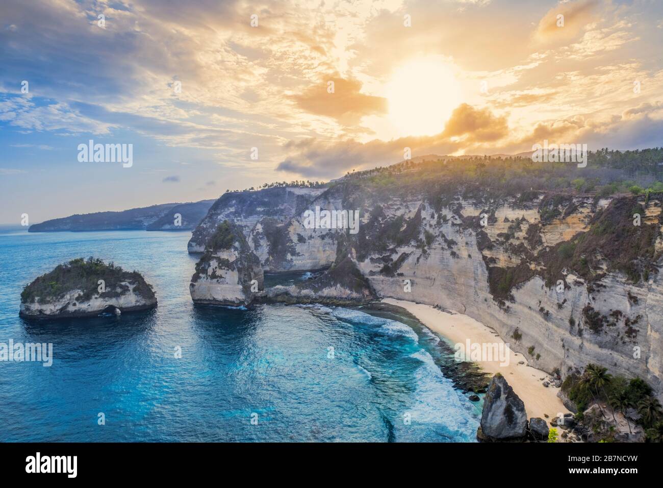 Indonesia, Bali, Penida Island. View of the cliffs and beach at Atuh ...