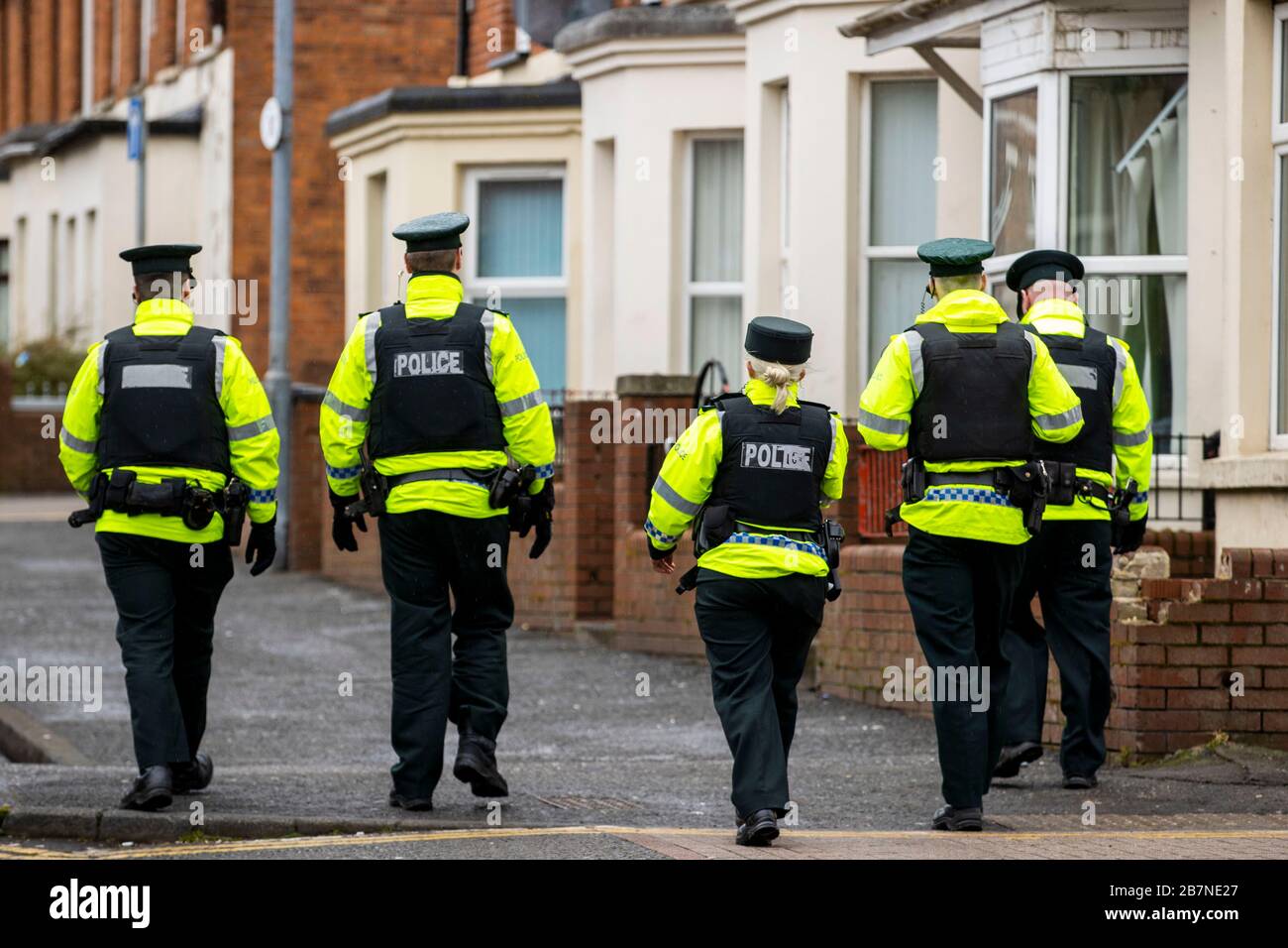 PSNI officers patrol the student area of Belfast known as the Holylands ...