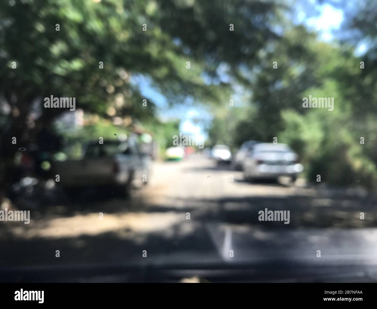 Blurred picture Road Soi village background in city Stock Photo - Alamy