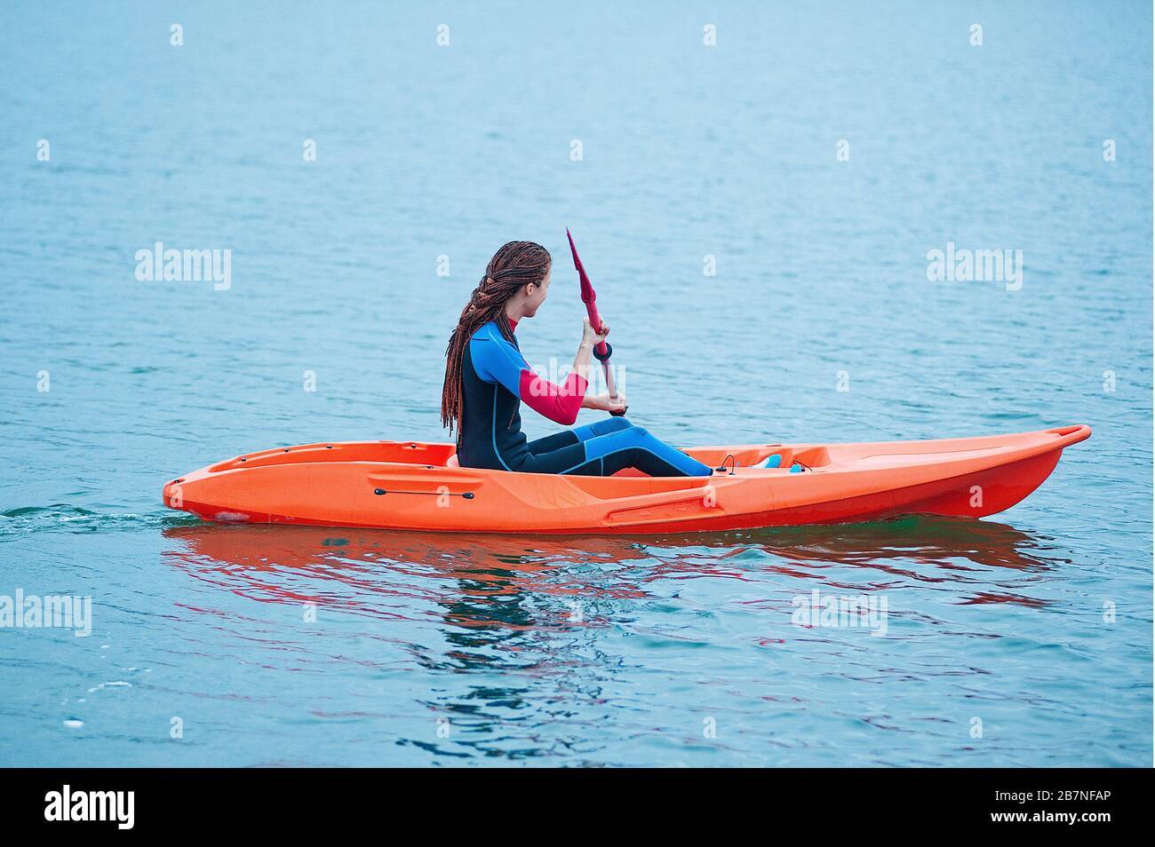 Woman wetsuit lake hi-res stock photography and images - Alamy