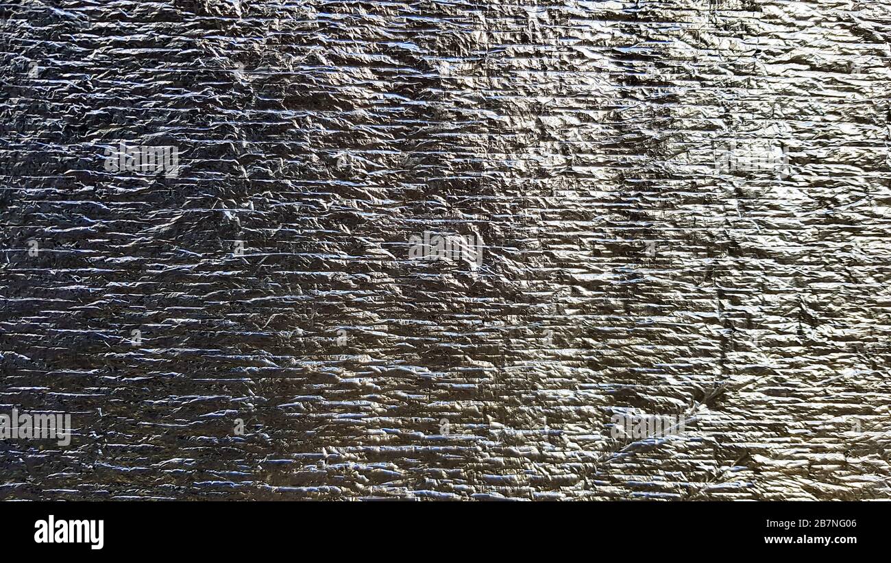 silver rough wrinkled foil texture. Crumpled shiny metal foil texture ...
