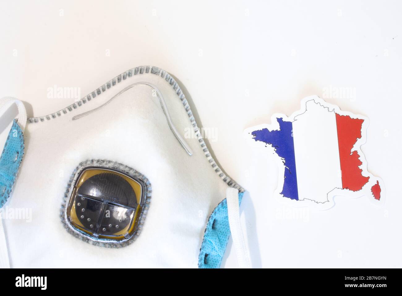 Respirator with France country flag top view. Flat lay with medical ...