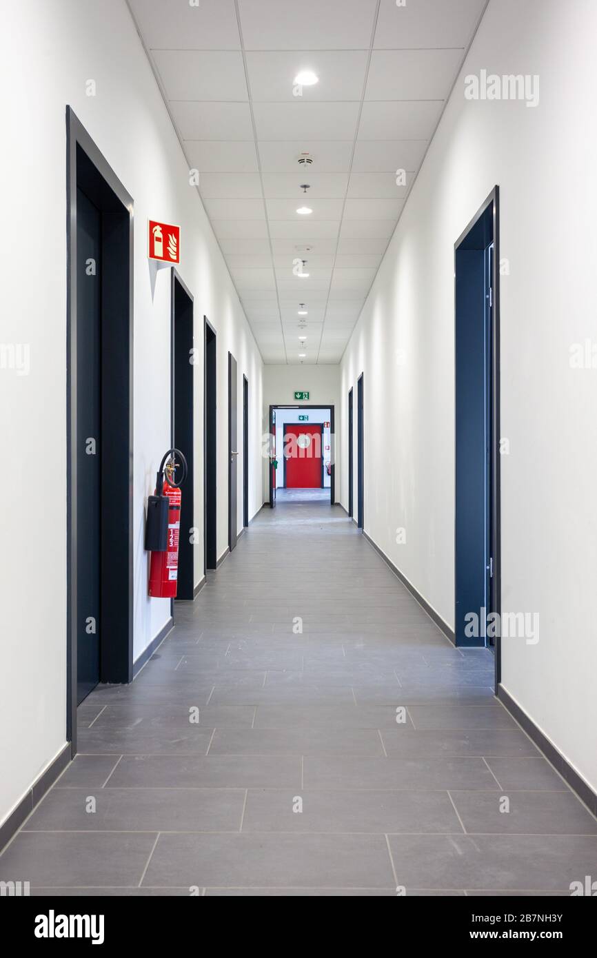 Interior vertical shot of a hallway in an office building Stock Photo ...