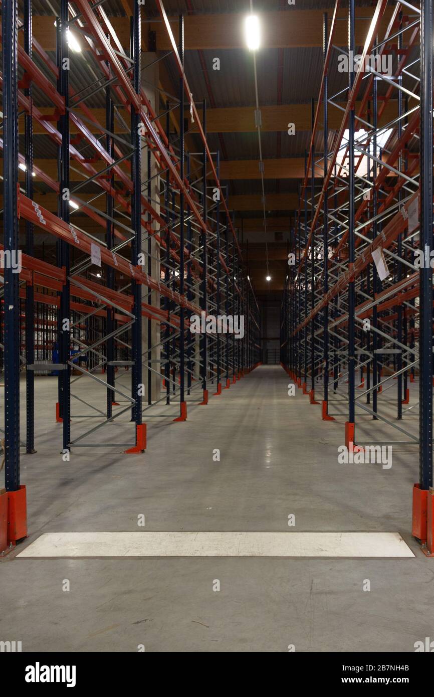 Vertical shot of storage racks in a warehouse Stock Photo - Alamy