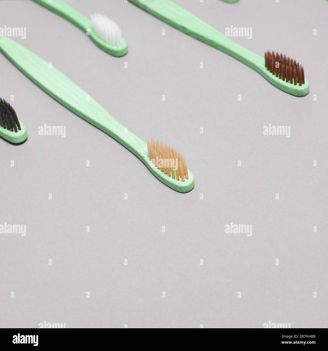 Many toothbrash at table. Different color. Diagonal Stock Photo - Alamy