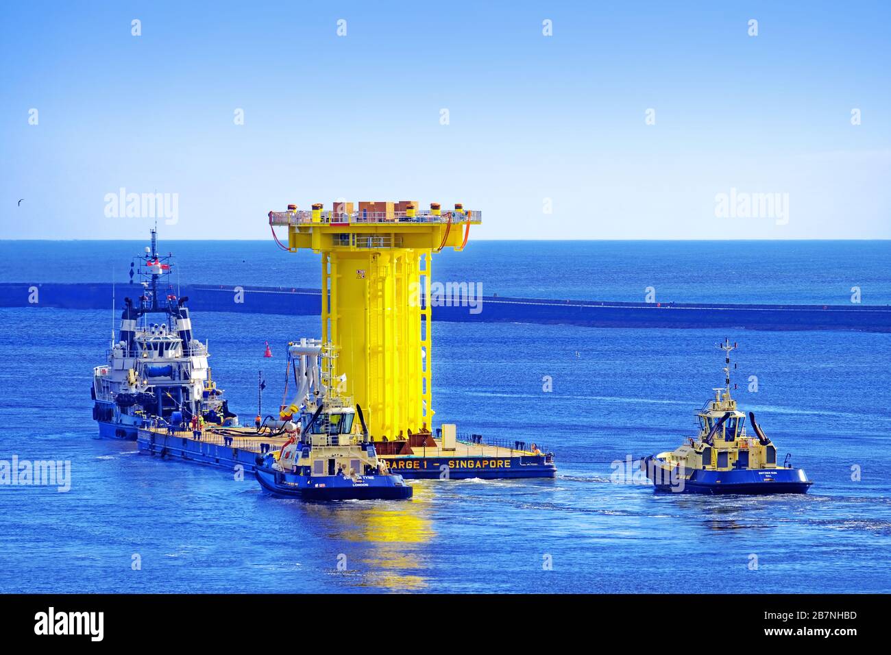 Tug Centaurus and two more moving two wind turbine structures to the ...