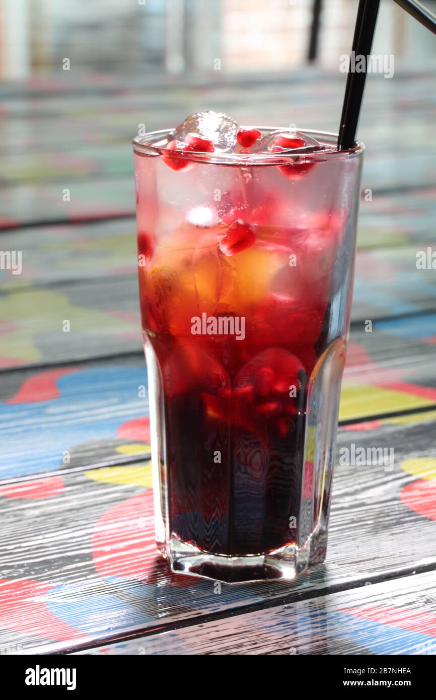 Berry-citrus cocktail on a white isolated background Stock Photo - Alamy