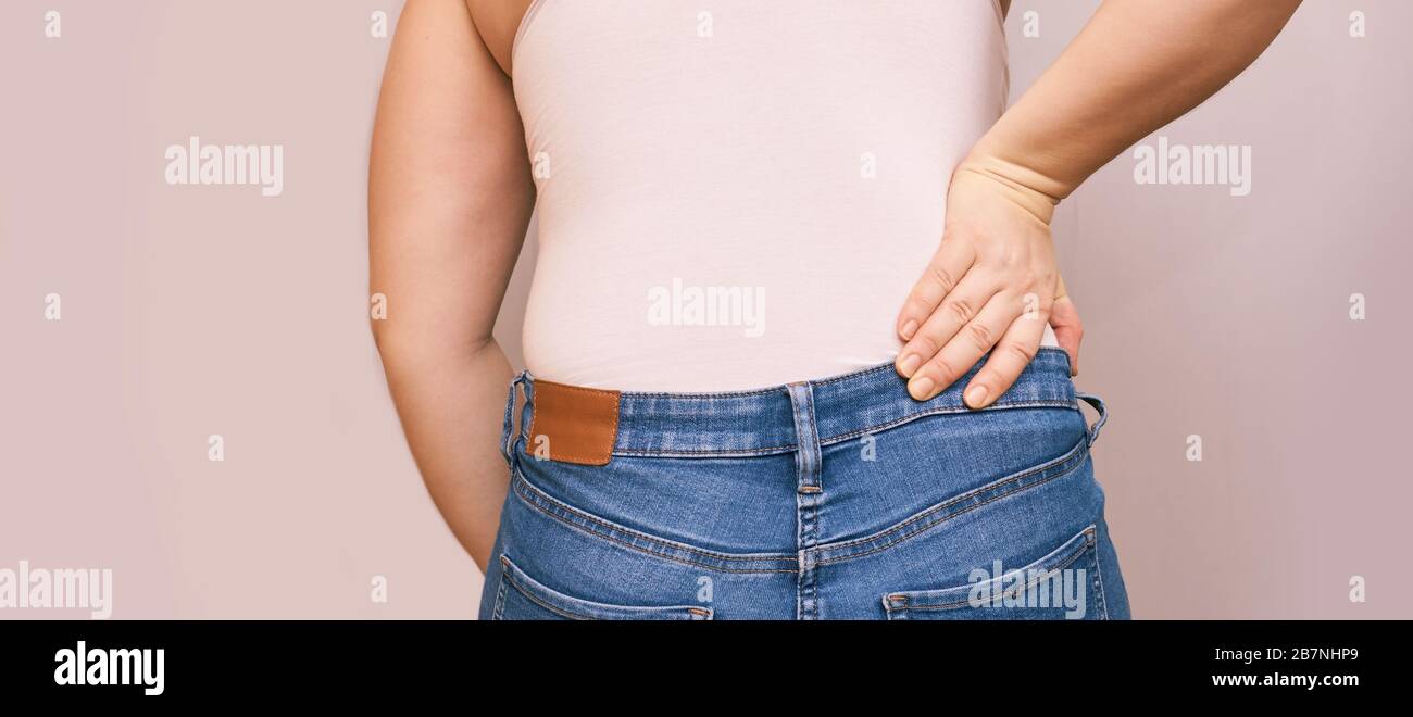 Female lower back pain hi-res stock photography and images - Alamy