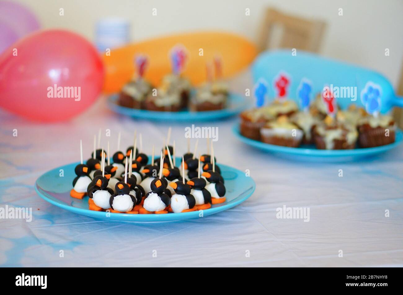 Lot of penguin snacks made with mozzarella cheese and carrots for a ...