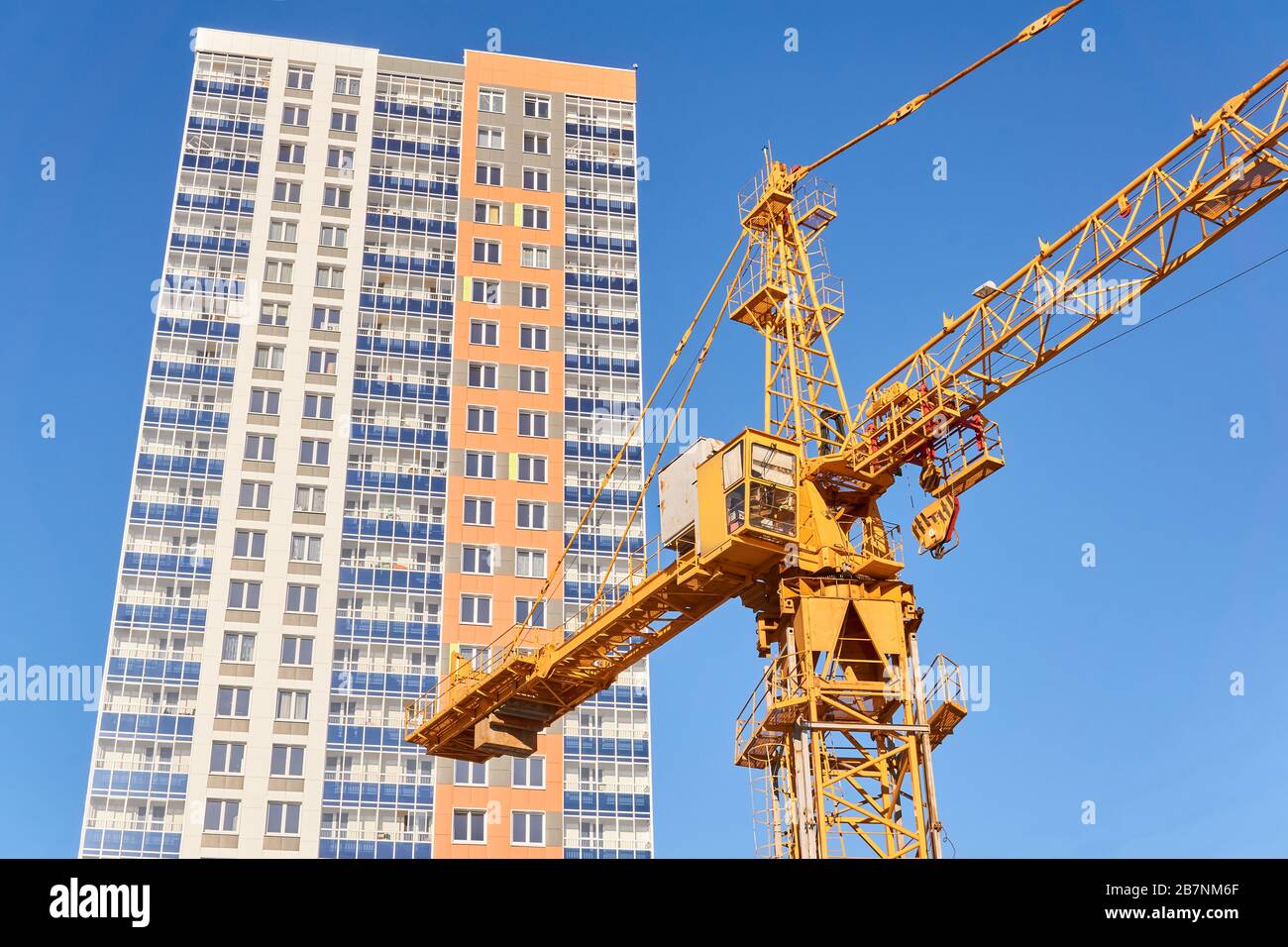 Multi storey Construction Cabin And Boom Of A Tower Crane And The multi-storey-construction-cabin-and-boom-of-a-tower-crane-and-the