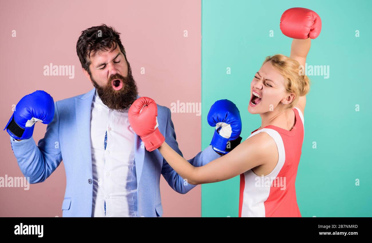 Man and woman boxing fight. Couple in love competing in boxing ...