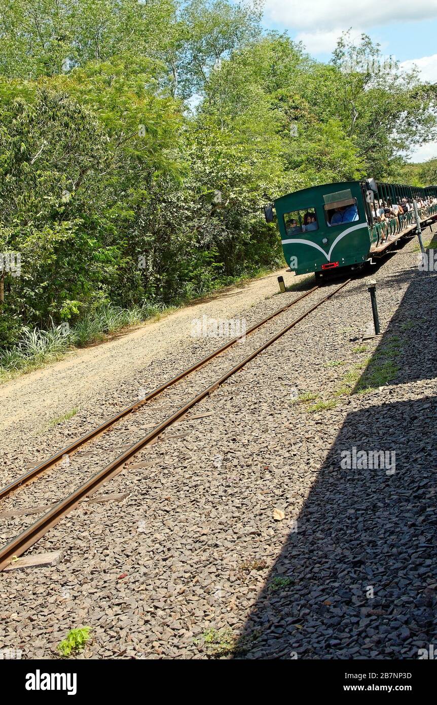 open-air train; people; crowded, transportation, signal light, moving ...