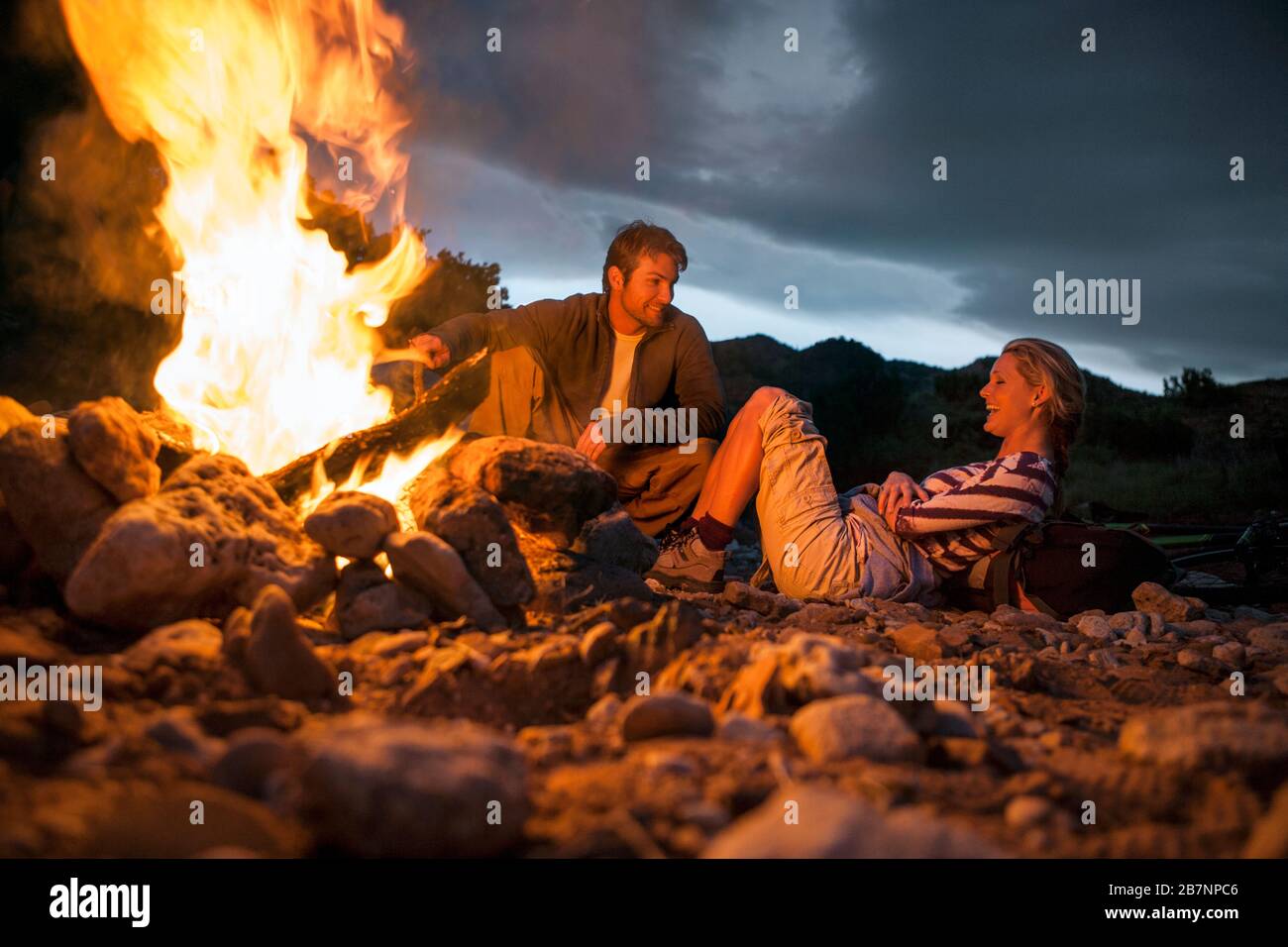 Sitting beside fire hi-res stock photography and images - Alamy