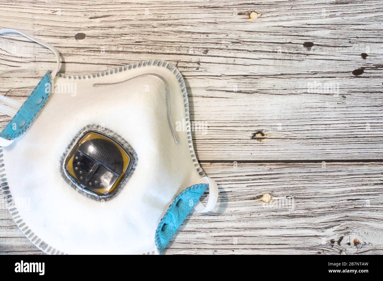 Virus protection mask close-up. Respirator top view with copy space ...