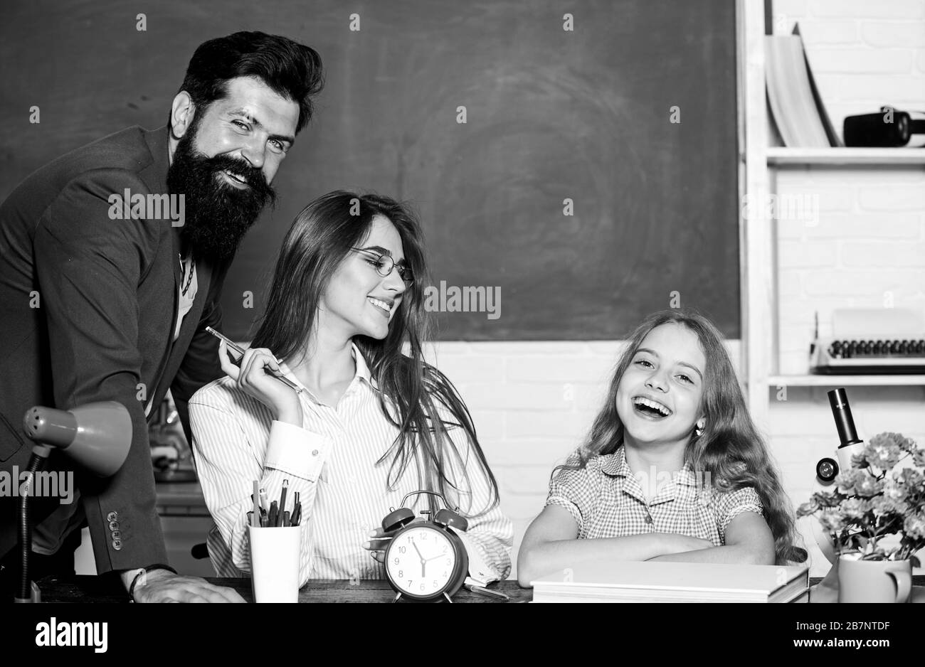 Tutor for excellence. Extra classes. Gifted child. Little girl studying ...