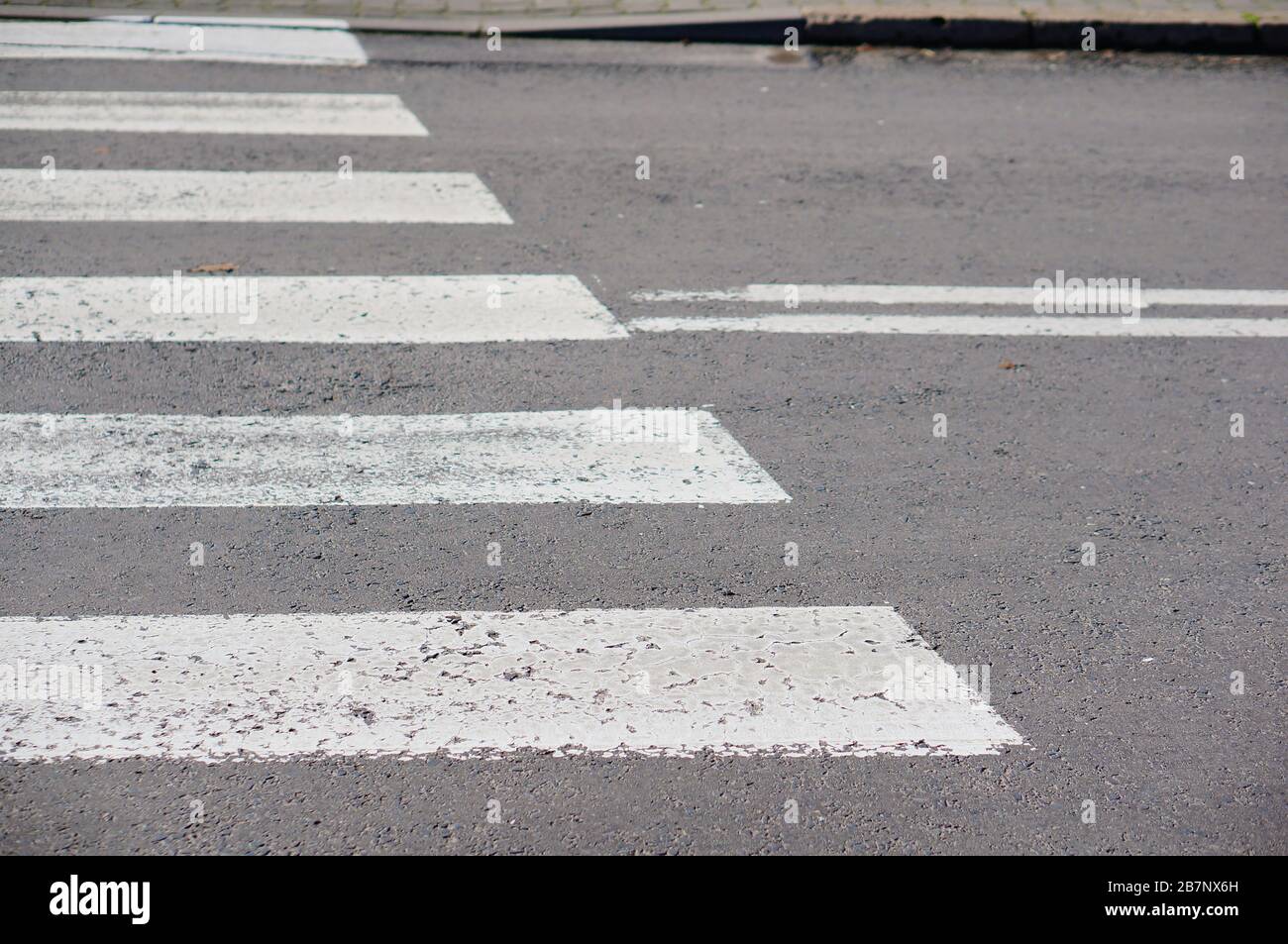 White crossing lines with a blurred background Stock Photo - Alamy