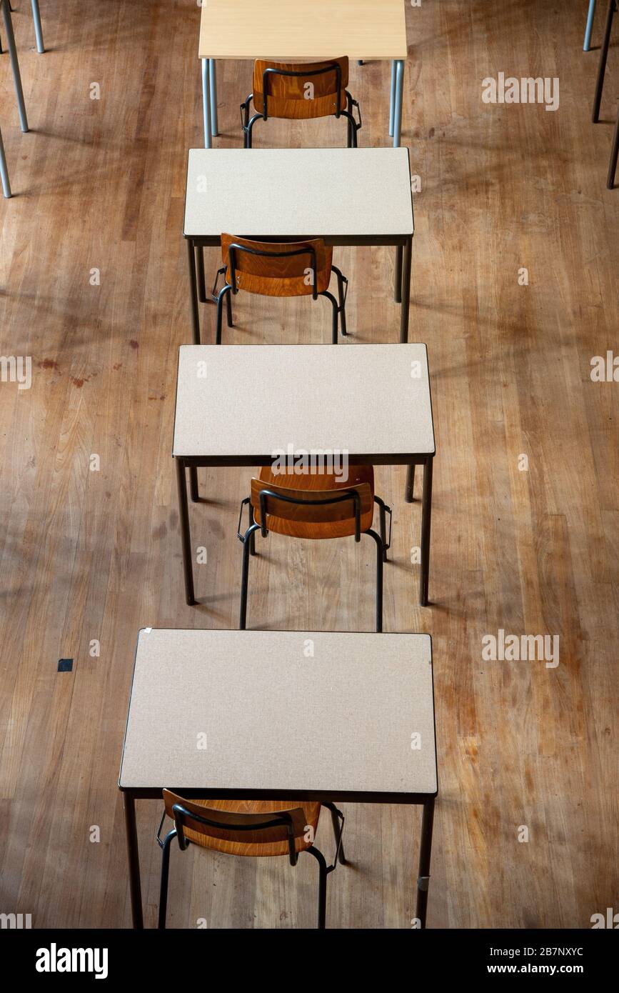 rows of empty chairs and tables in exams room at highschool Stock Photo ...