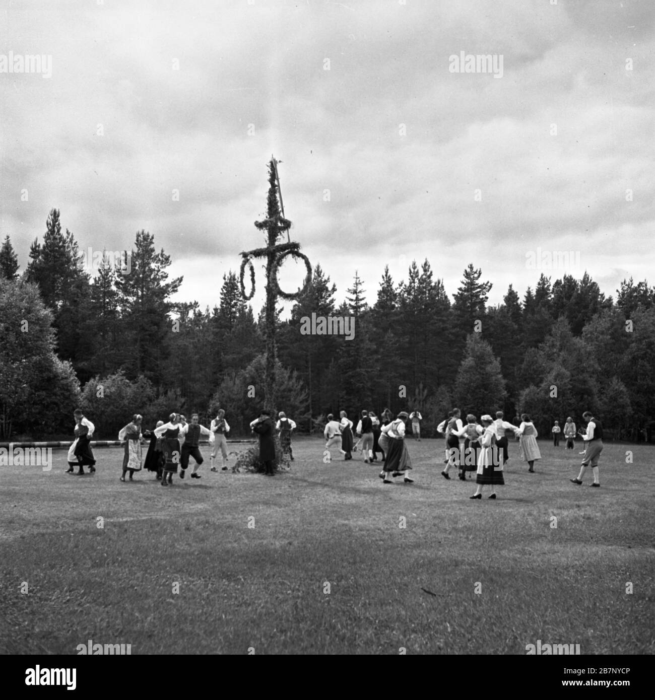 Midsummer celebrations at Mullsjo, Sweden, 1950. Dancers in traditional ...