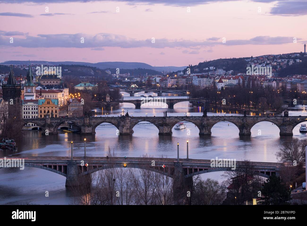 Prague cityscape at twilight. Classic panoramic view of bridges across the Vltava river Stock ...