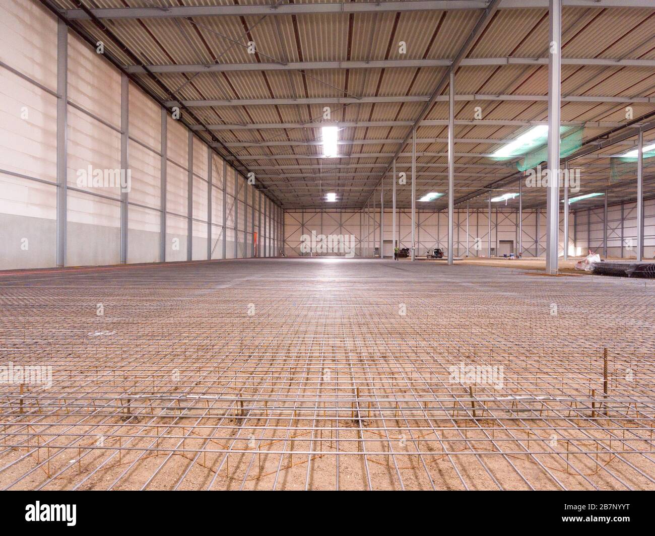 Installation of a rebar for the floor construction of a new warehouse ...