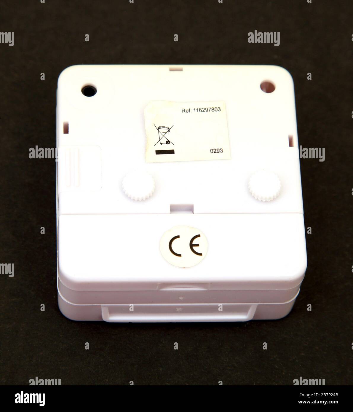 BAck View of Mini Travel Alarm Clock Showing Setting Cogs and Battery ...