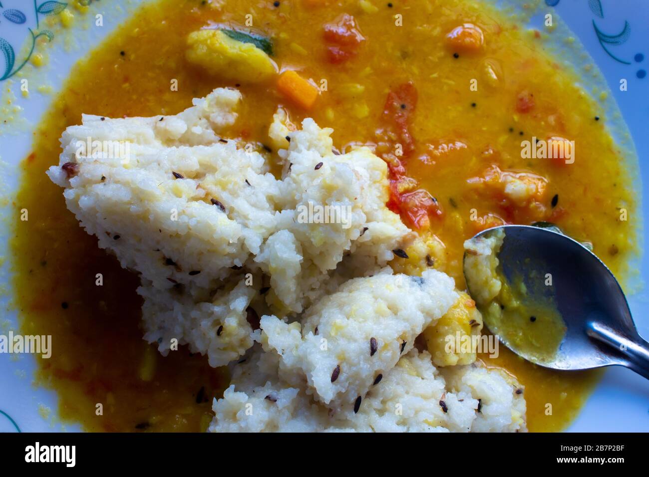 Ven Pongal (which is a popular breakfast dish in south india) with ...