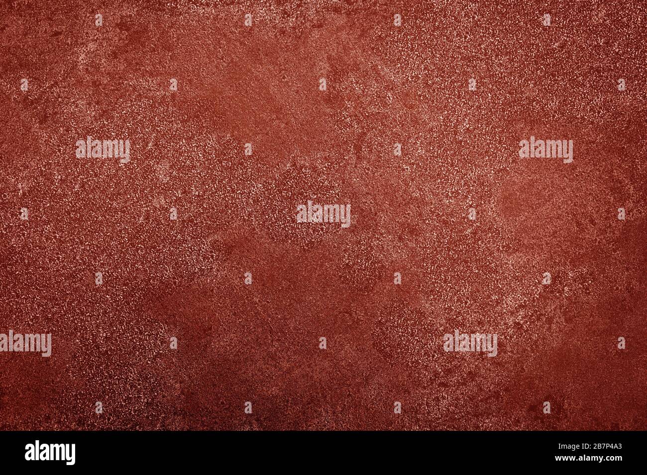 Grunge maroon red uneven stone texture background with cracks and ...